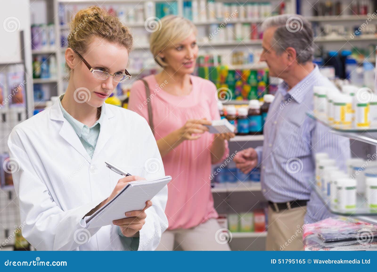 Pharmacist Writing on Clipboard Stock Image - Image of coat, discussion ...