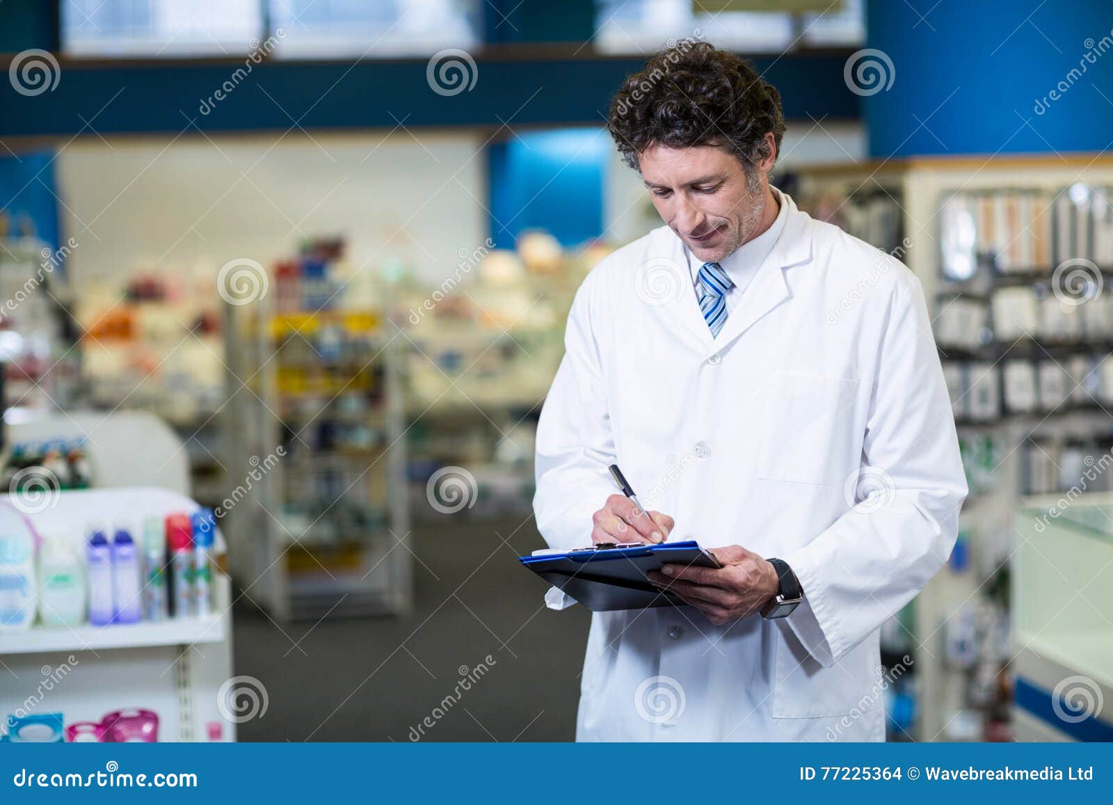 Pharmacist Writing on Clipboard Stock Photo - Image of expertise ...