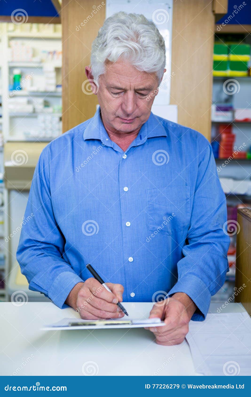 Pharmacist Writing on Clipboard Stock Image - Image of pharmaceutics ...