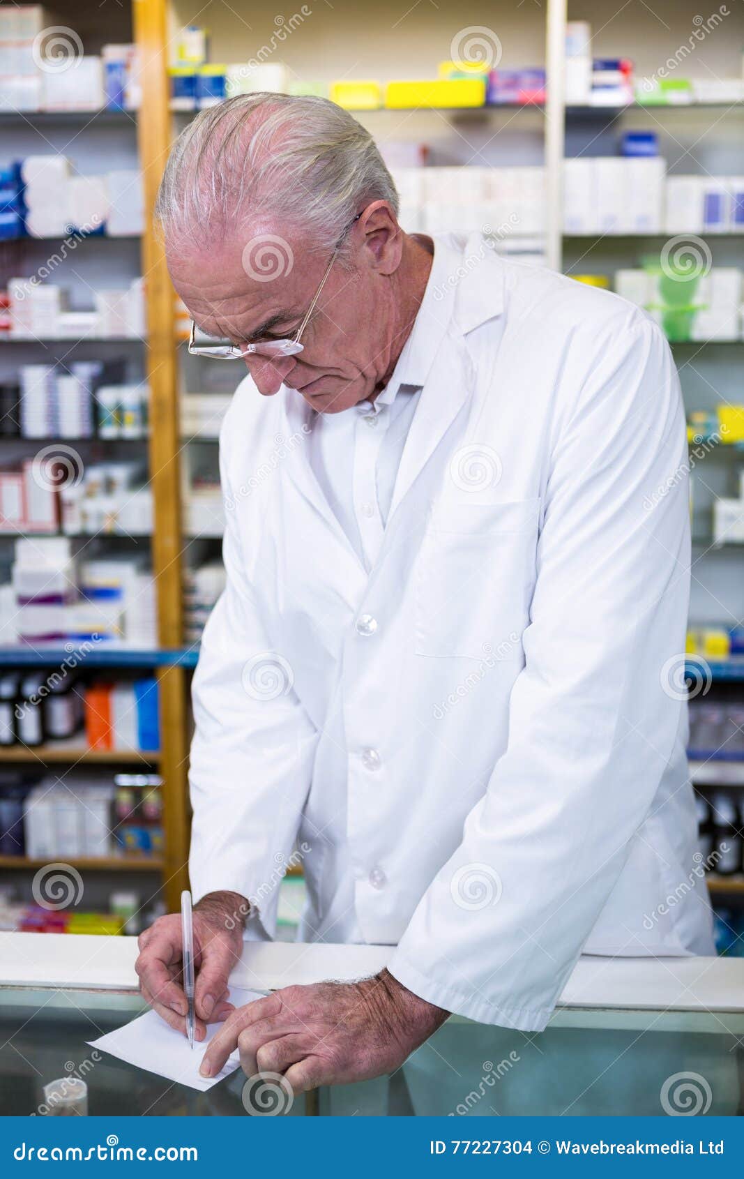Pharmacist Writing Prescriptions for Medicines Stock Photo - Image of ...
