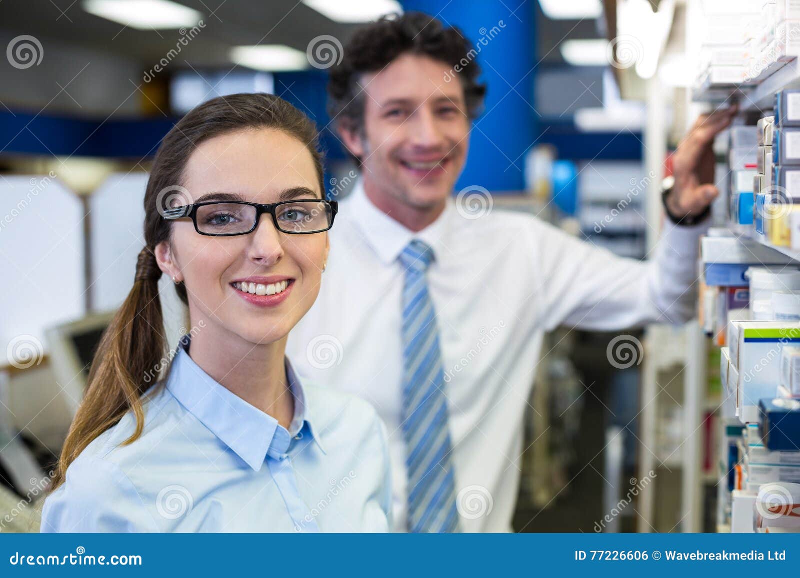 Pharmacists Checking Medicines on Shelf in Pharmacy Stock Photo - Image ...