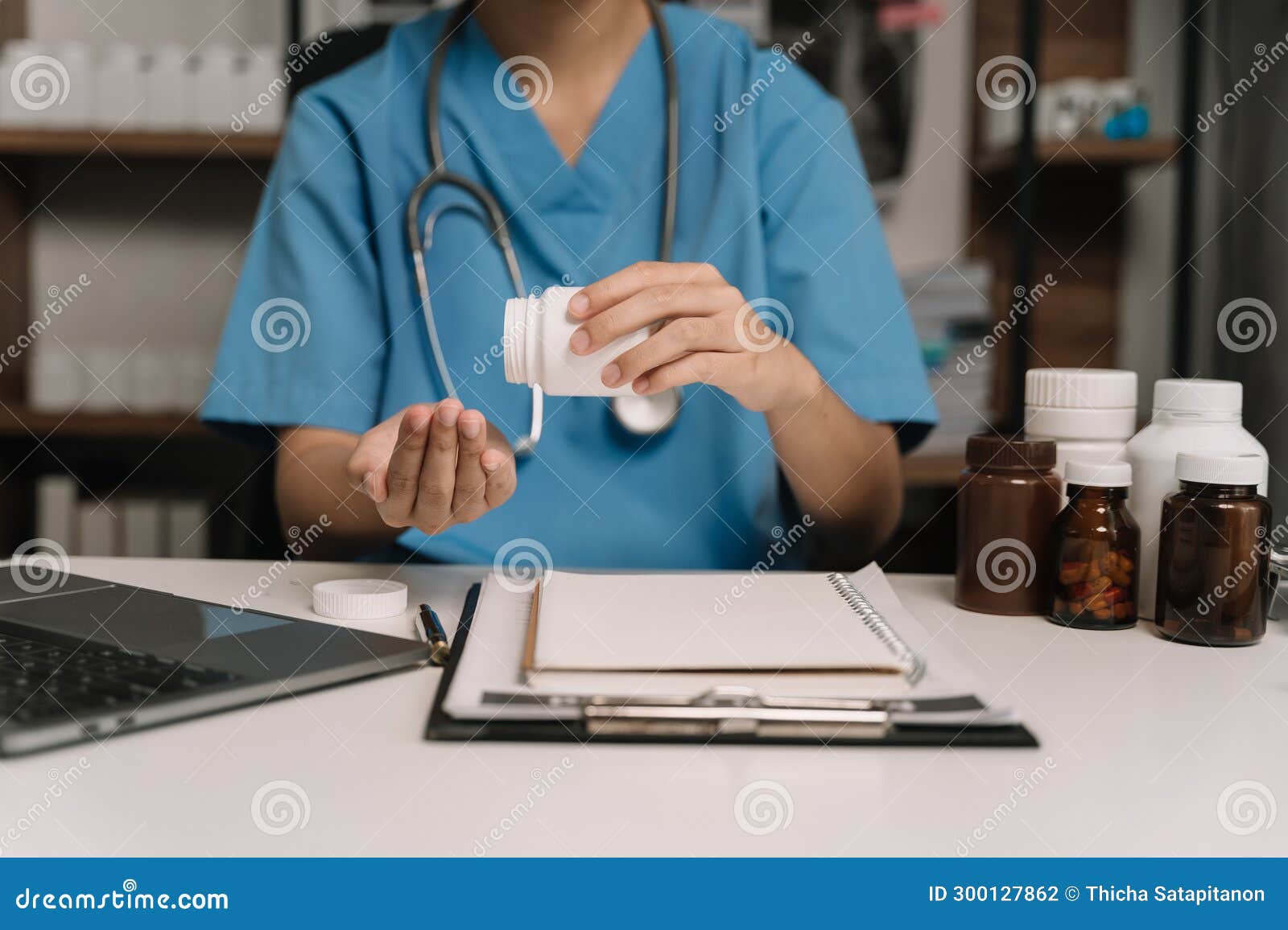 Pharmacists or Doctors Study Information about Tablets in the Operating ...