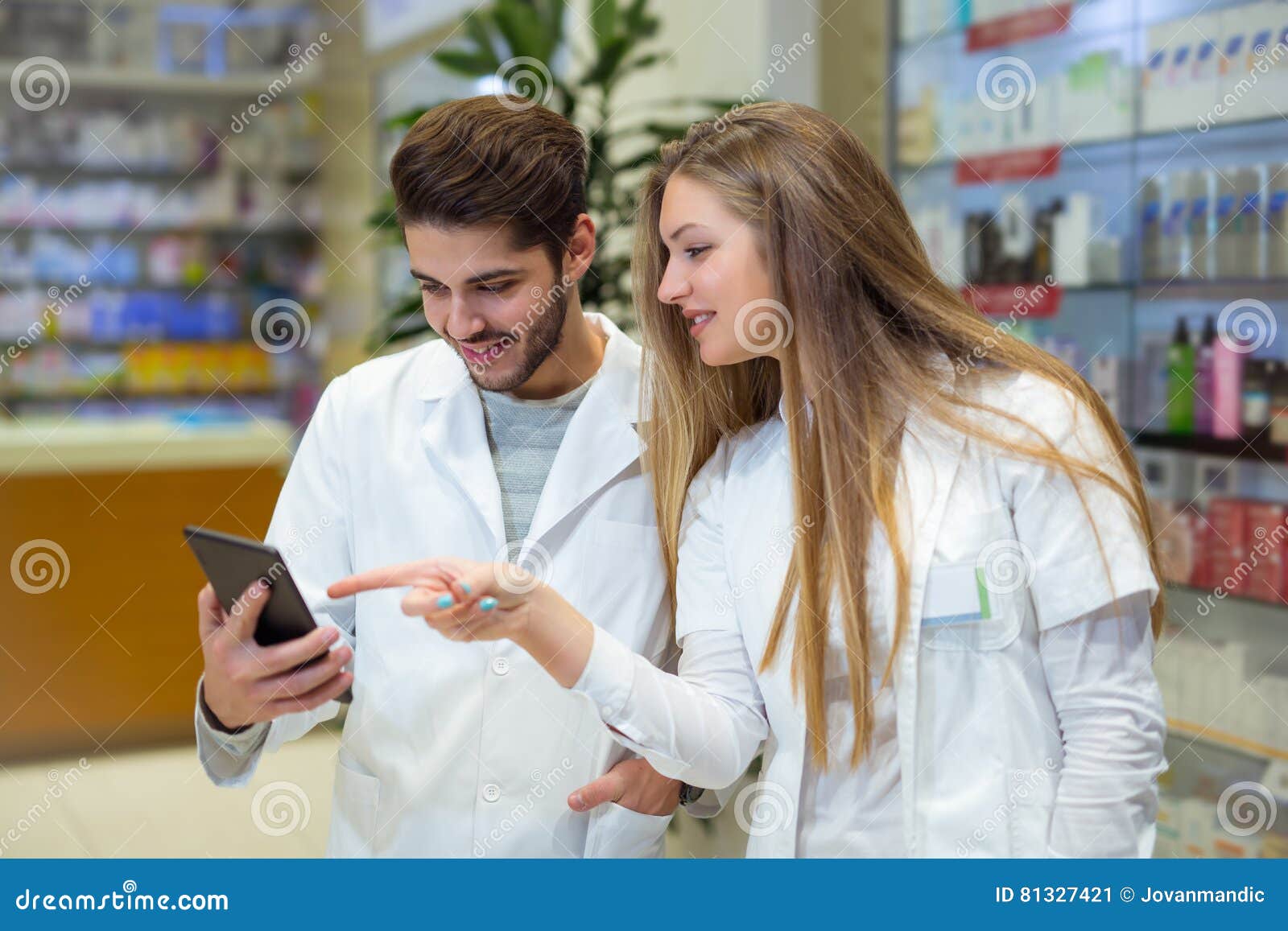 Pharmacists Using Digital Tablet while Checking Medicine Stock Image ...
