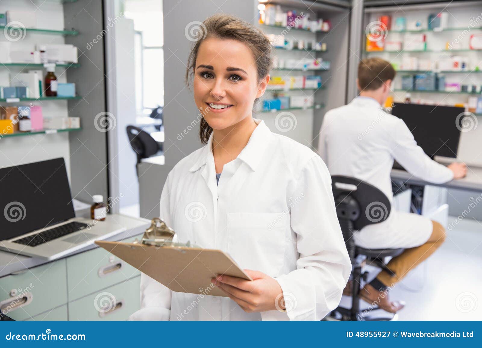 Pharmacy Intern Smiling at Camera Stock Image - Image of woman, indoors ...