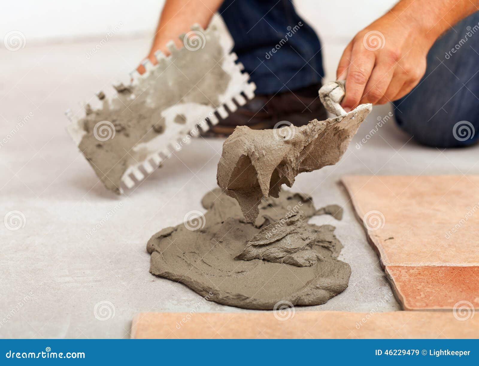 Phases of Installing Ceramic Floor Tiles - Apply the Adhesive Stock ...