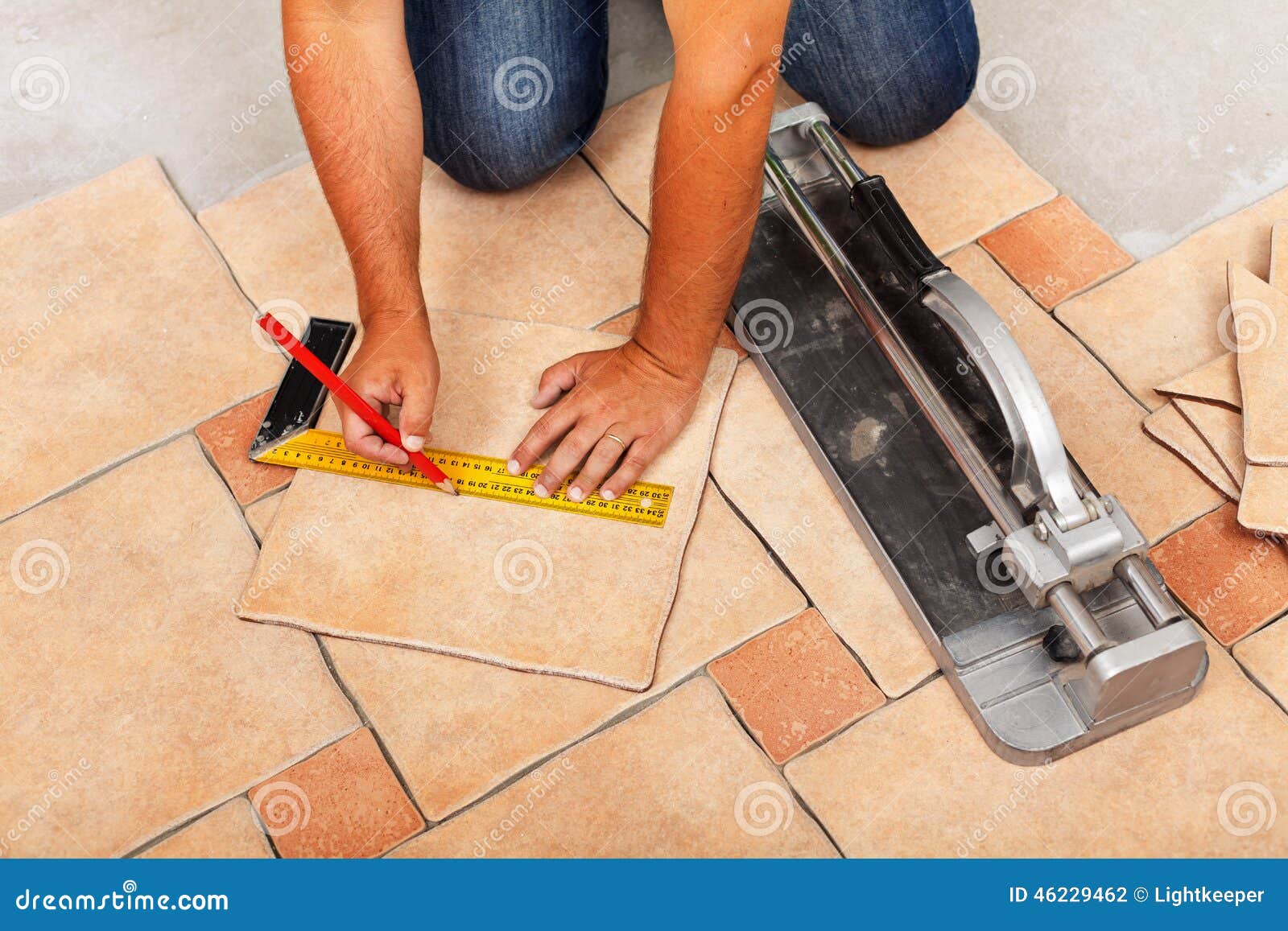 Phases Of Installing Ceramic Floor Tiles Placing The Tile Royalty