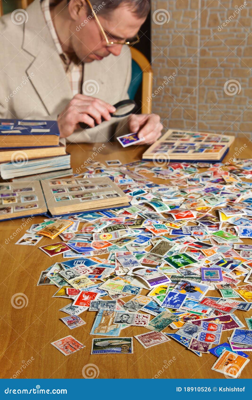 Philatelist editorial photo. Image of indoors, adult - 18910526