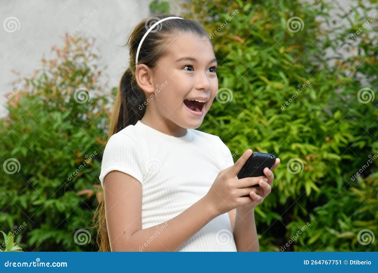 Philippina Child and Excitement Using Cell Phone Stock Image - Image of ...