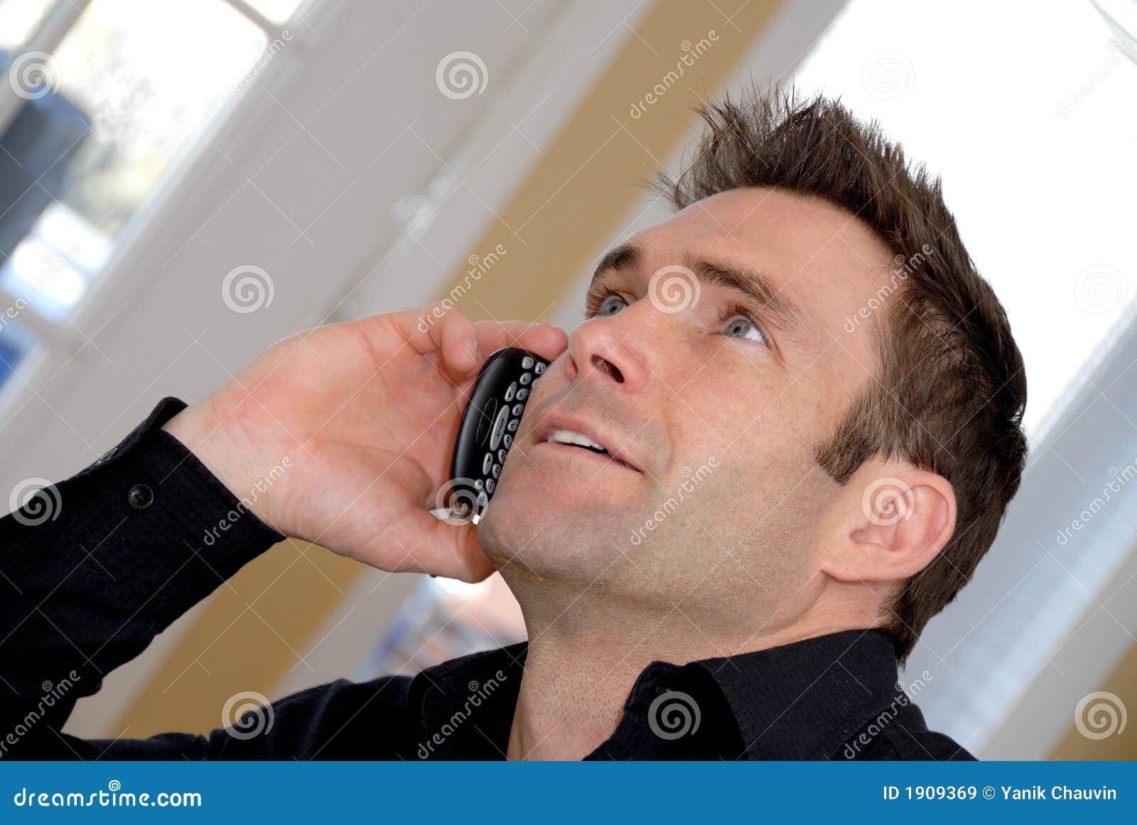 On the phone stock image. Image of room, blackberry, cellphone - 1909369