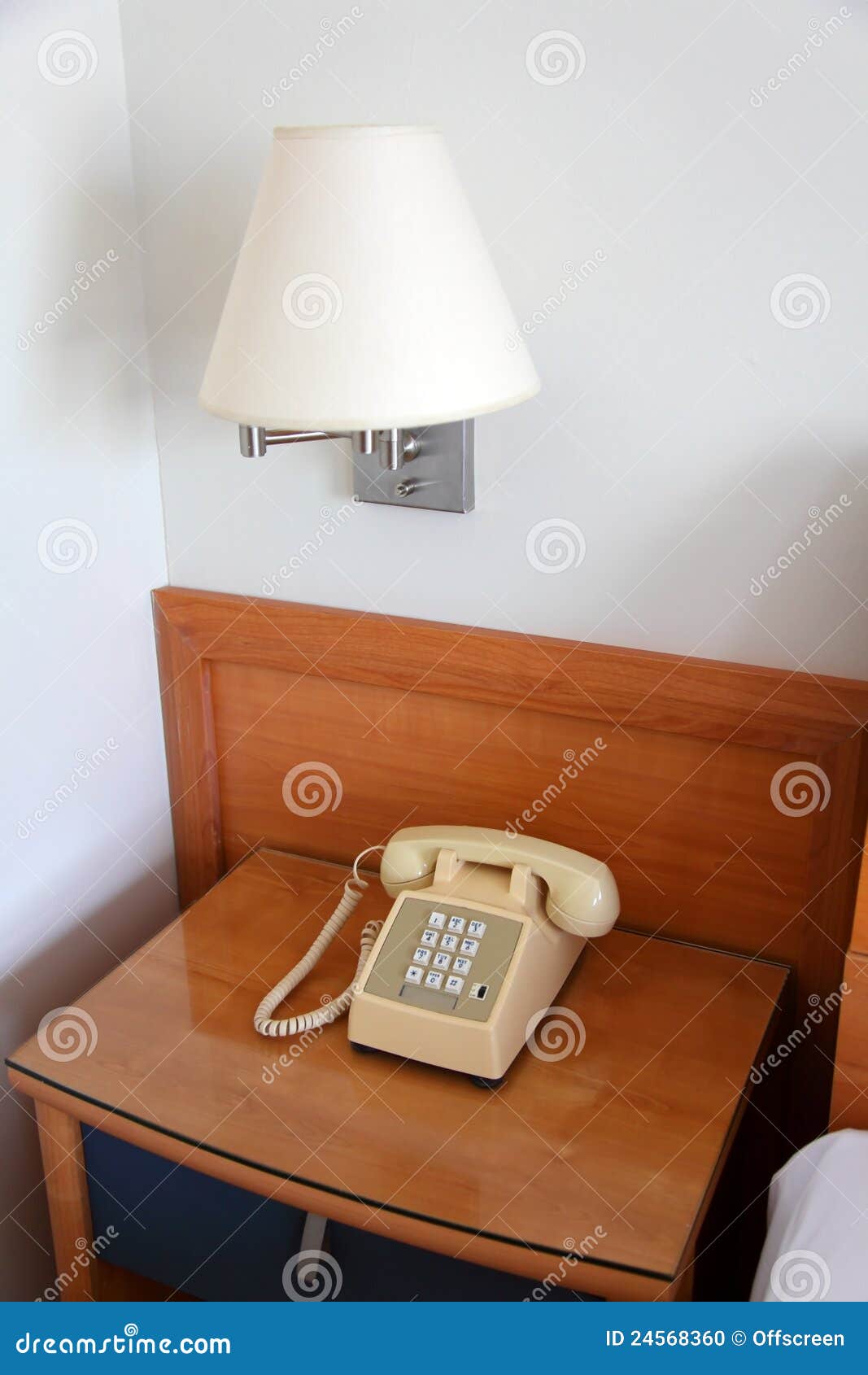 Phone on the bedside table stock photo. Image of telecommunications ...