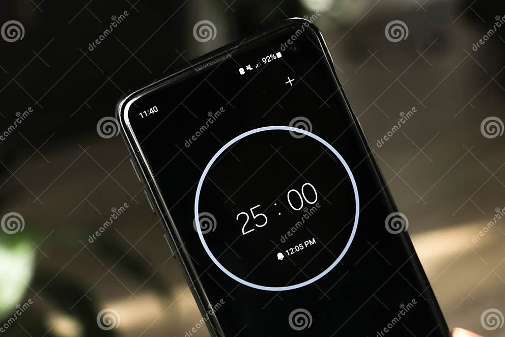 A Phone with a Black and White 25-minute Timer Stock Photo - Image of background, alarm: 267907650