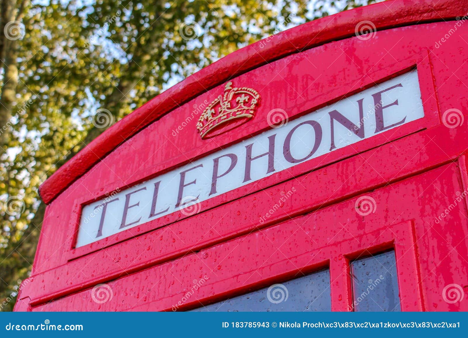 Phone booth after a rain stock image. Image of street - 183785943