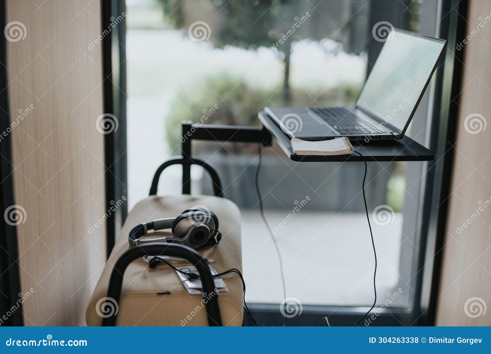Phone Booth Setup: Seating, Small Desk, Laptop, a Mobile Workspace ...