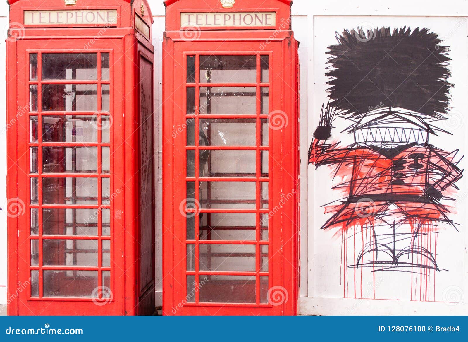 A Phone Box with Graffiti of a Foot Guard Editorial Image - Image of ...
