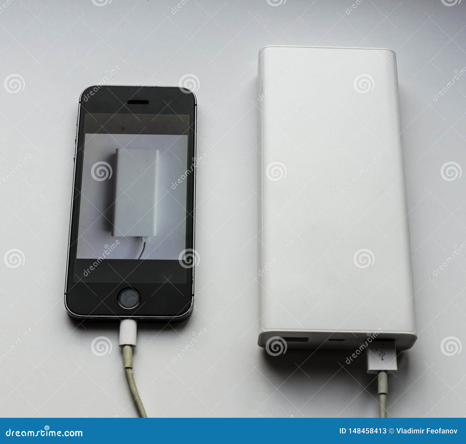 Phone is Charging from the Power Bank of Large Capacity, Fast Charging ...