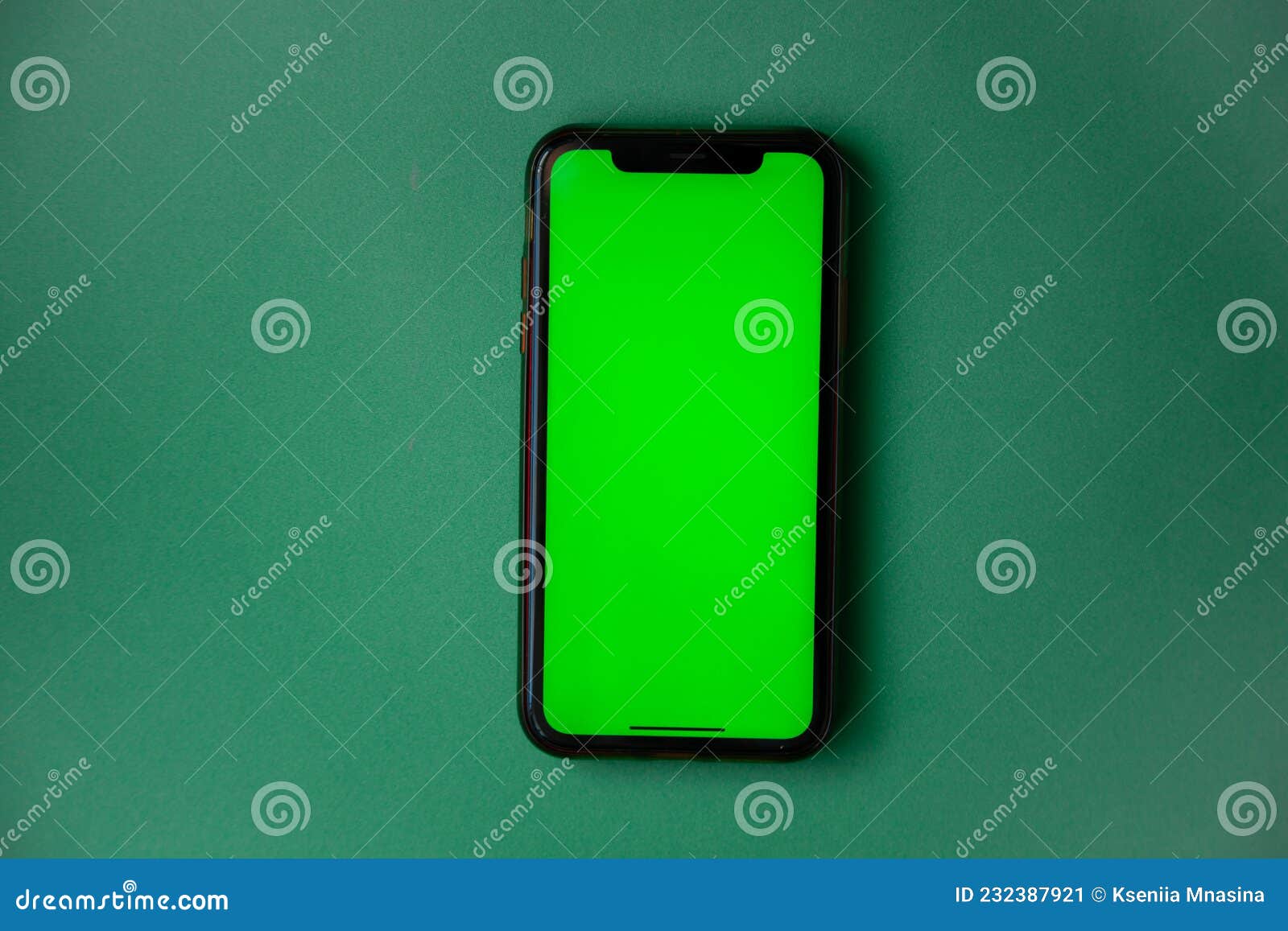 The Phone with a Green Screen is on a Green Background. Stock Image ...