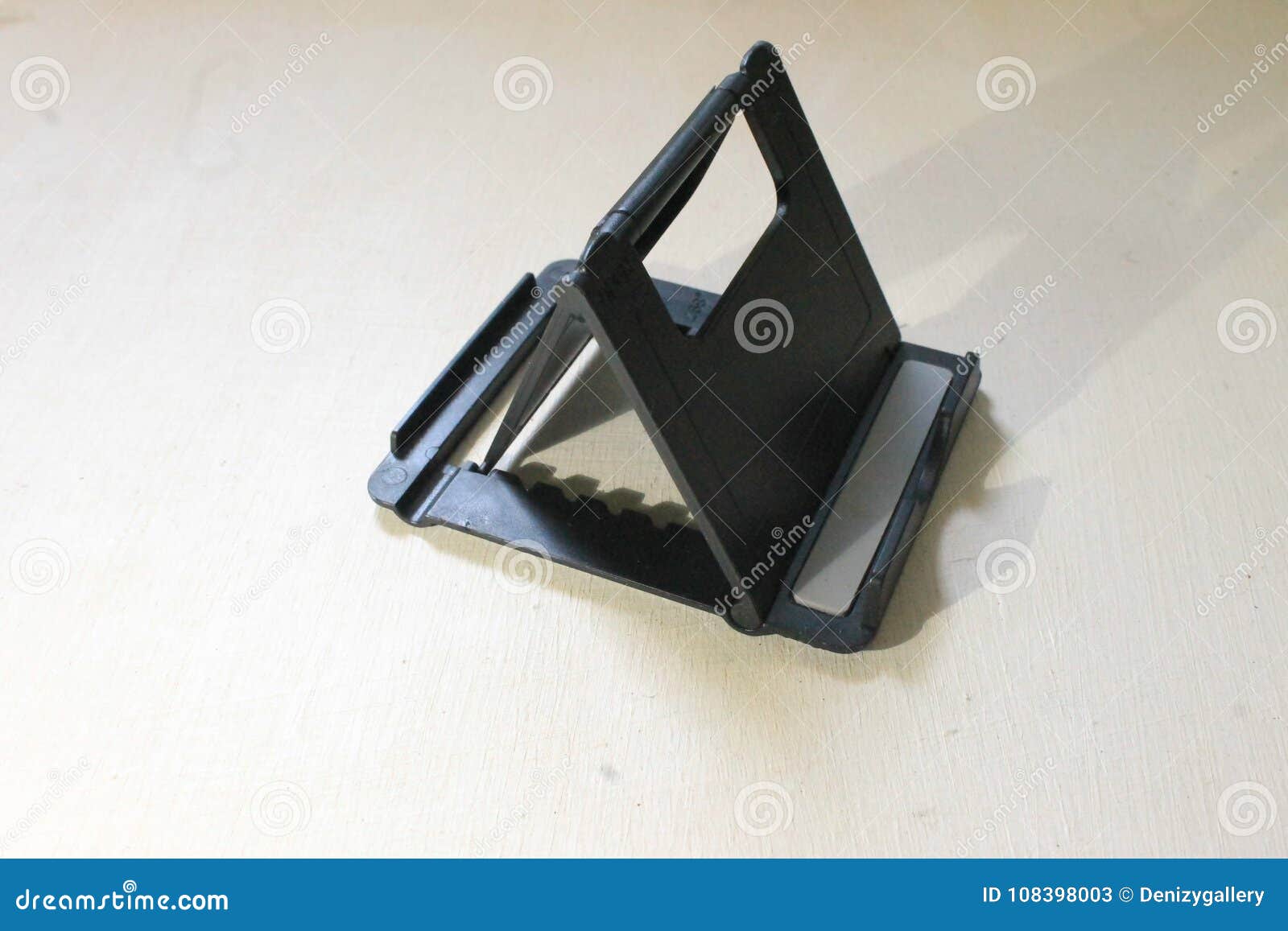 Phone holder stock image. Image of slanted, holder, phone - 108398003