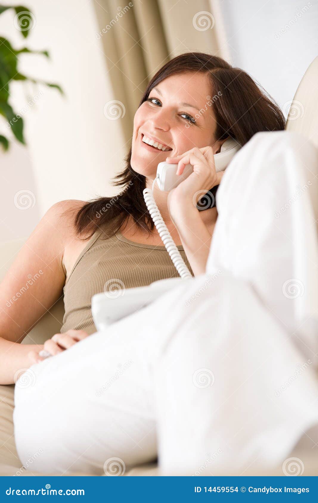 On the Phone Home: Young Woman Calling in Lounge Stock Photo - Image of ...