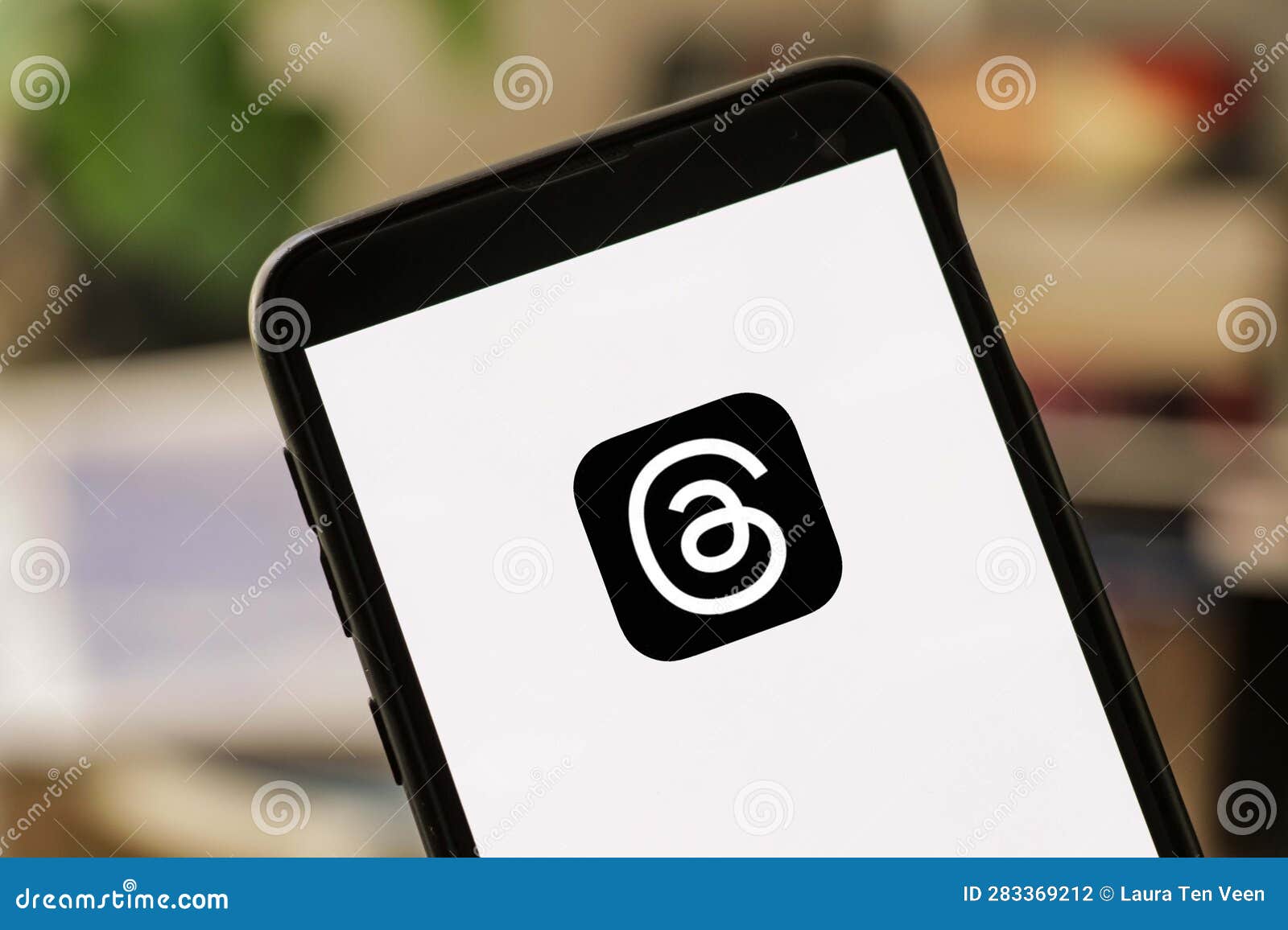 A Phone with the Logo of the New Social Media App Threads Editorial ...