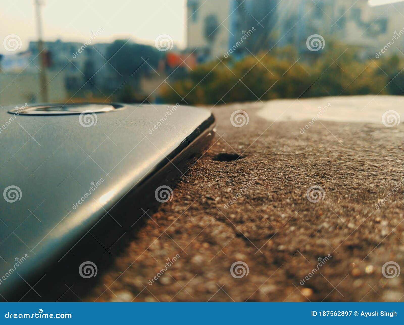 Phone lying on the ground stock image. Image of lying - 187562897