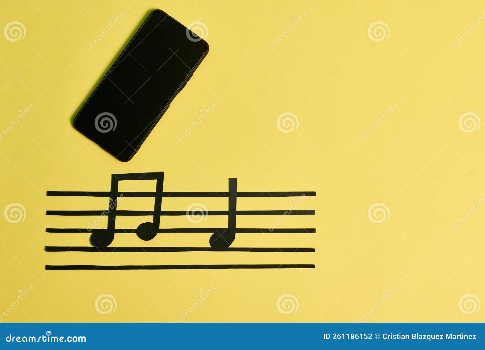 A Phone and Music Notes on a Yellow Background Stock Photo - Image of ...