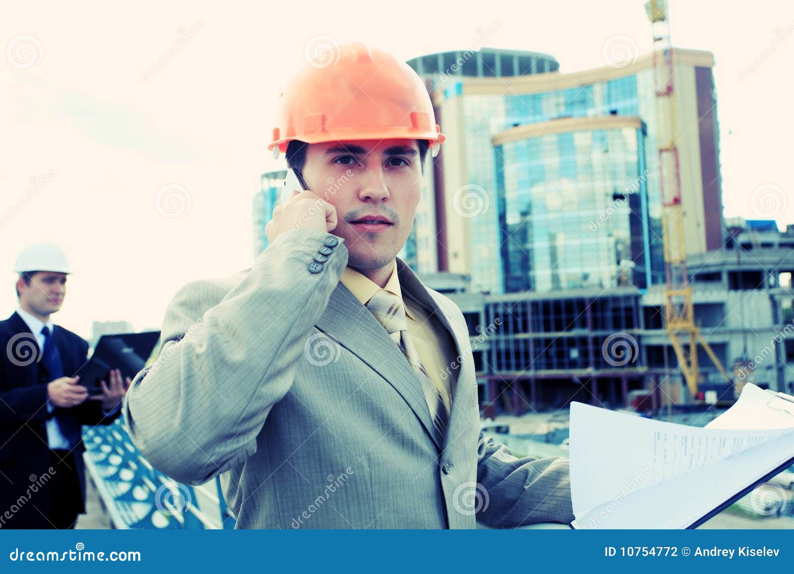 Phone negotiations stock photo. Image of helmet, builder - 10754772