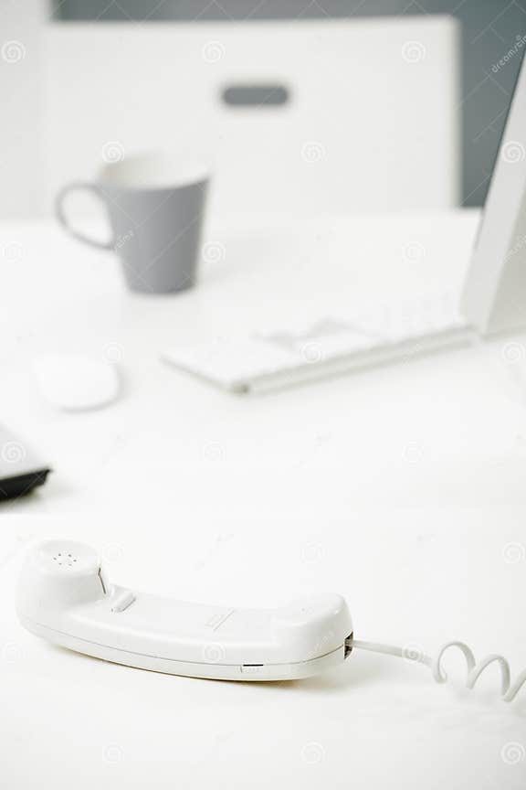 Phone on office desk stock image. Image of close, indoor - 17627751