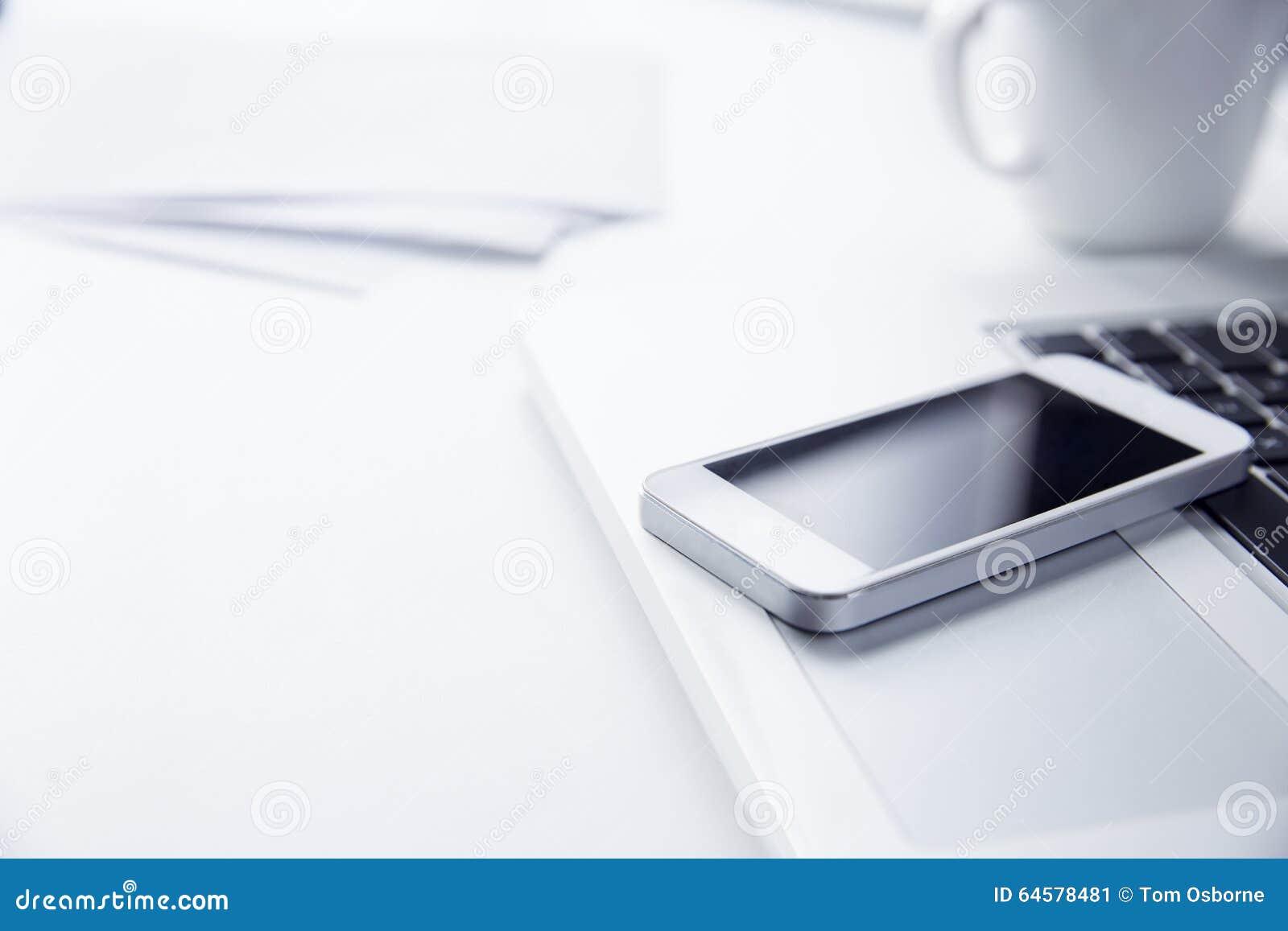 Phone Resting on a Laptop Computer Stock Image - Image of telephone ...