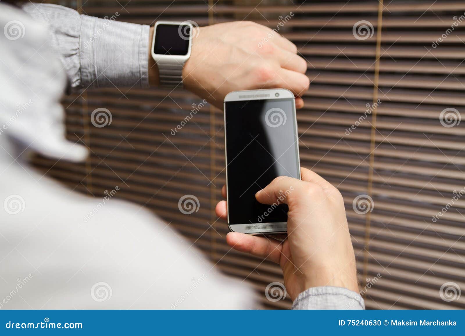 Phone and Smart Watch on a Male Hand Stock Photo - Image of gadget ...