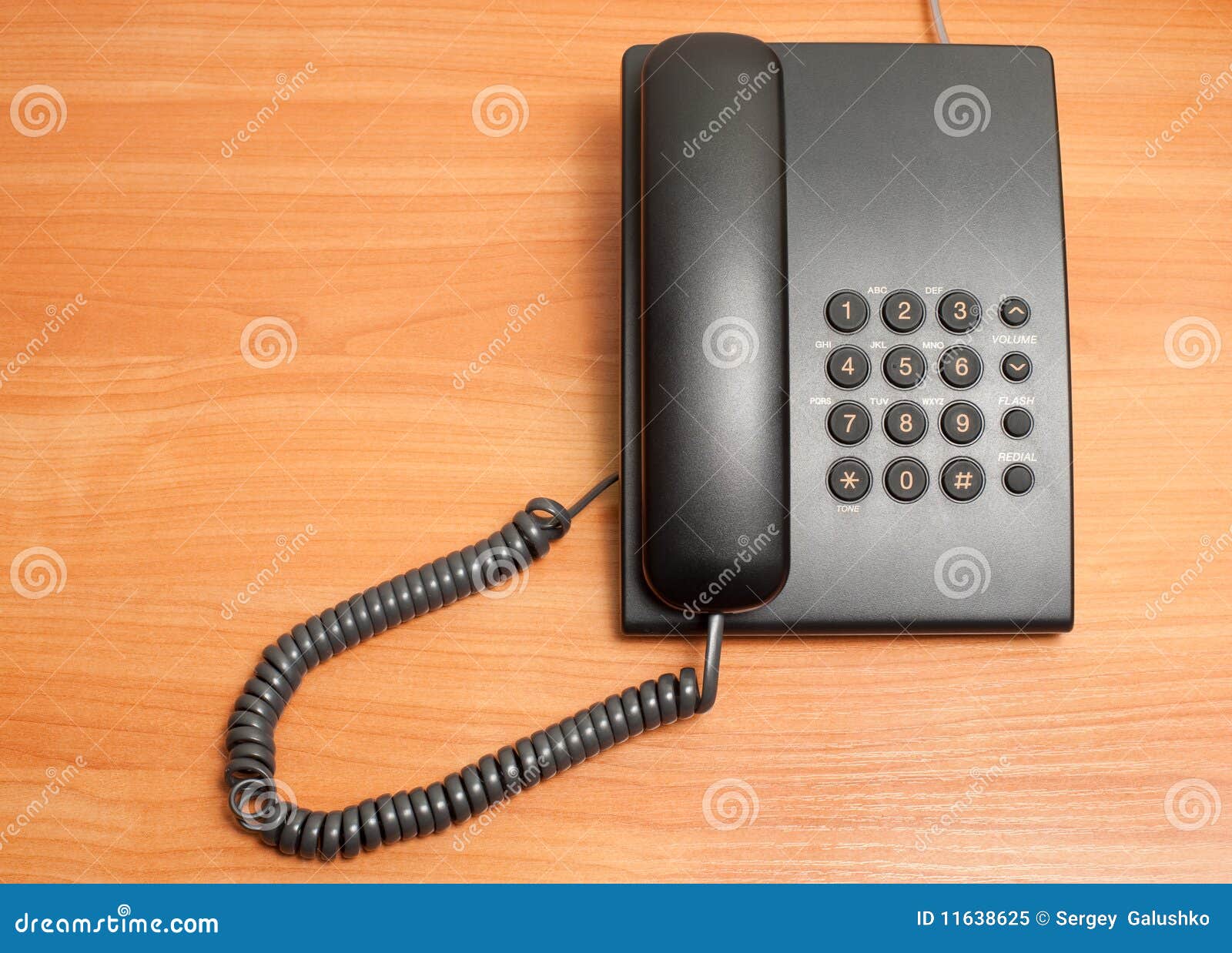 Phone on a table stock image. Image of keypad, table - 11638625