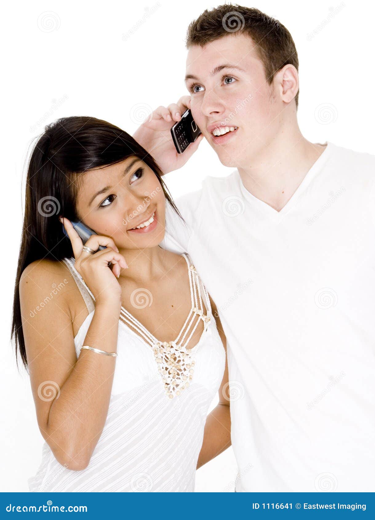 On Phones stock image. Image of lovers, woman, cellphone - 1116641