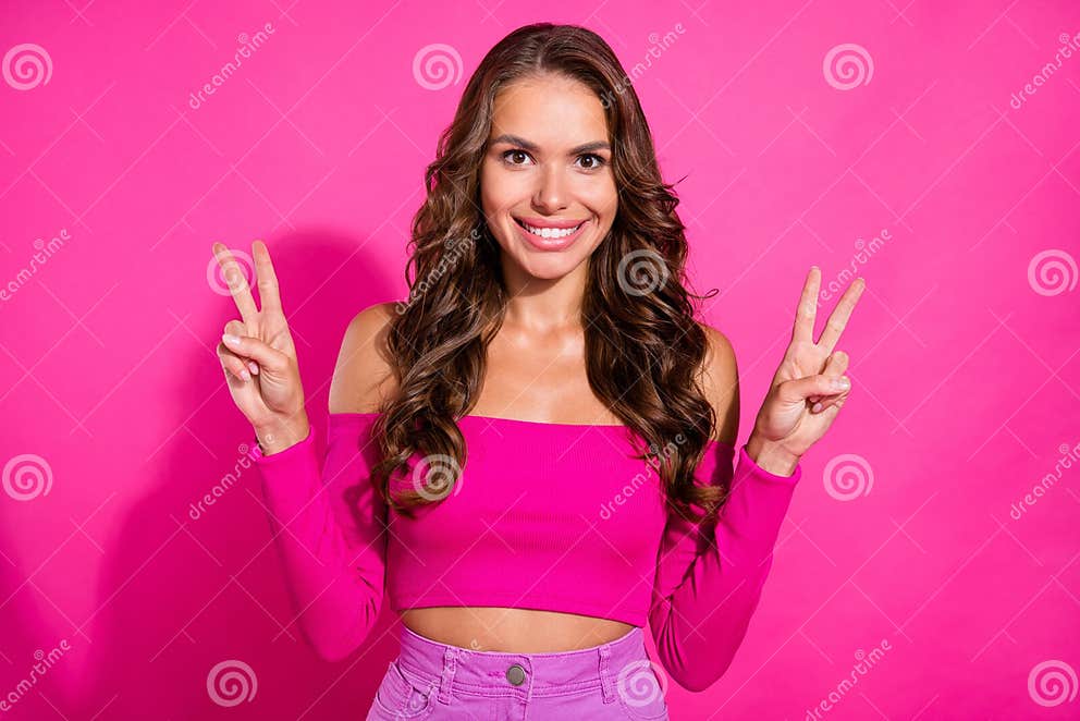 Photo Of Adorable Positive Lady Toothy Smile Two Hands Demonstrate V