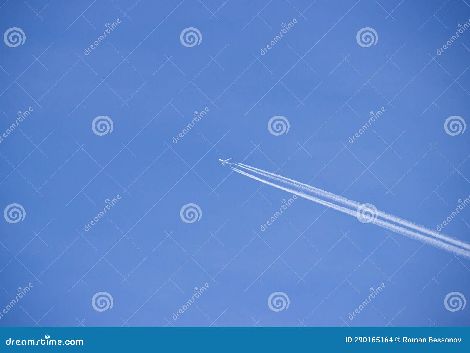 A Photo of an Airplane in Pure White, a Photo from the Ground Stock ...