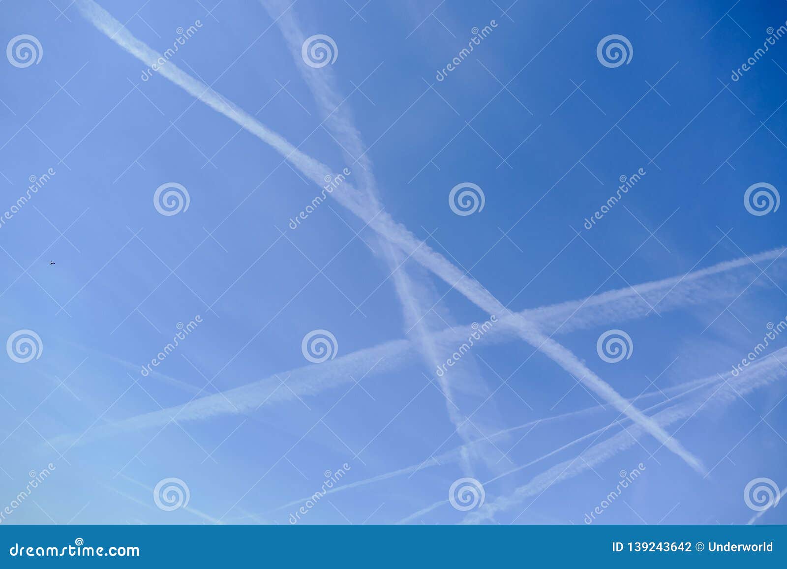 Airplanes crossing paths stock photo. Image of flight - 139243642