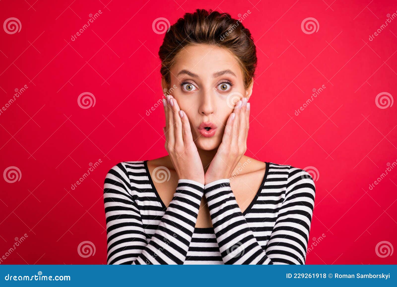 Photo Of Amazed Shocked Surprised Young Woman Hold Hands Face