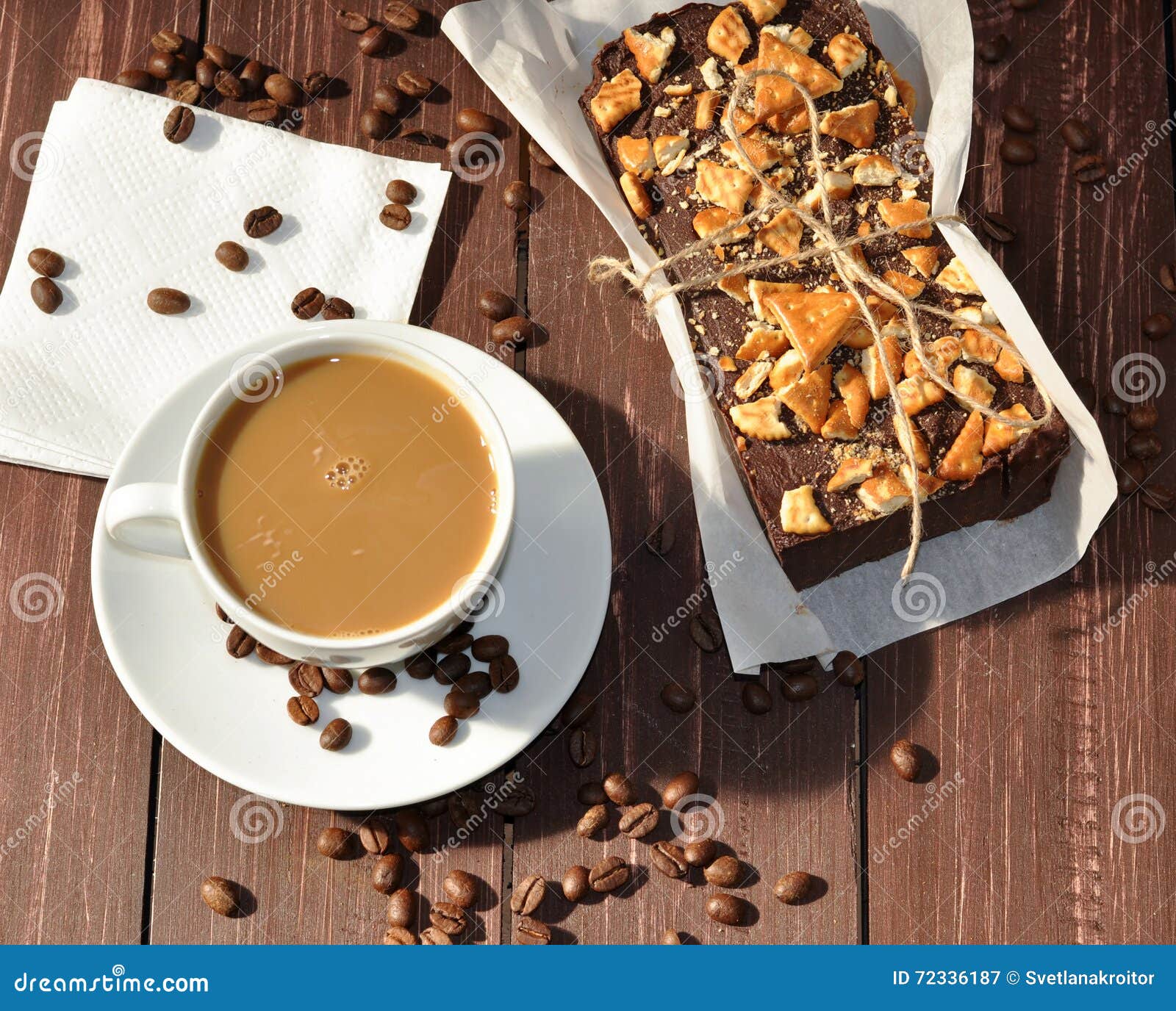 A Photo of an an Appetizing Chocolate Cake Decorated with Small Pieces ...