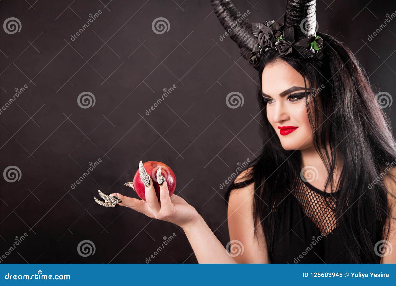 An Apple in the Hands of a Horned Witch Stock Image - Image of girl ...
