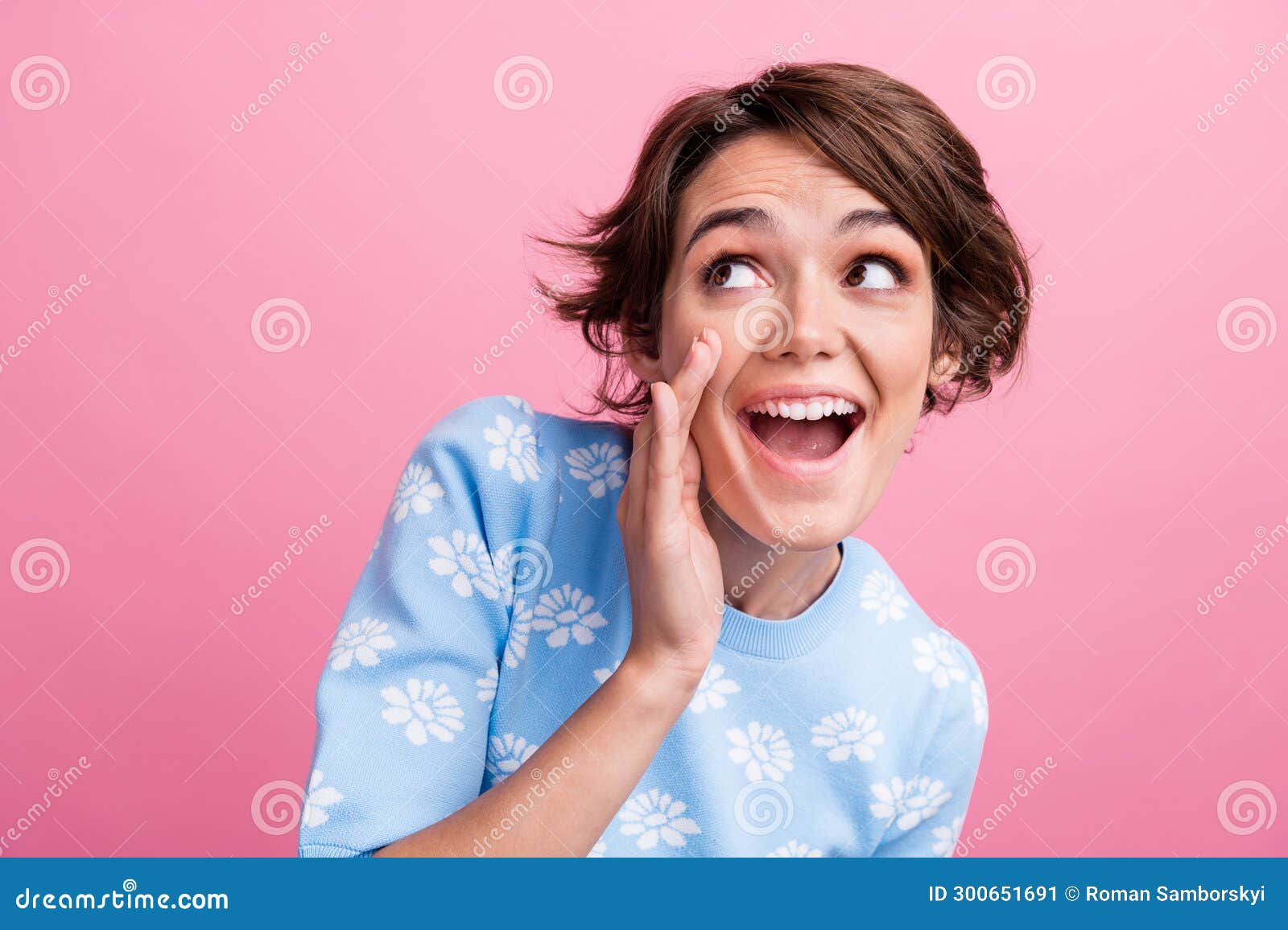 Photo Of Astonished Cheerful Girl Arm Near Open Mouth Look Communicate