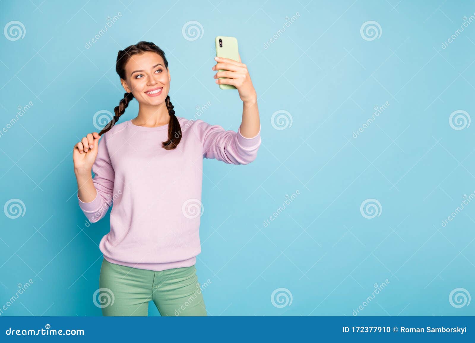 Photo Of Beautiful Lady Hold Telephone Hand Making Funny Selfies Online