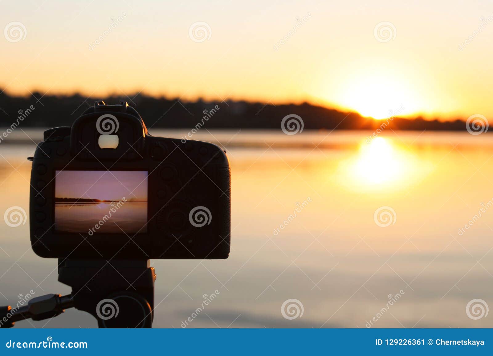 Photo of Beautiful Riverside Sunset on Display of Professional Camera ...