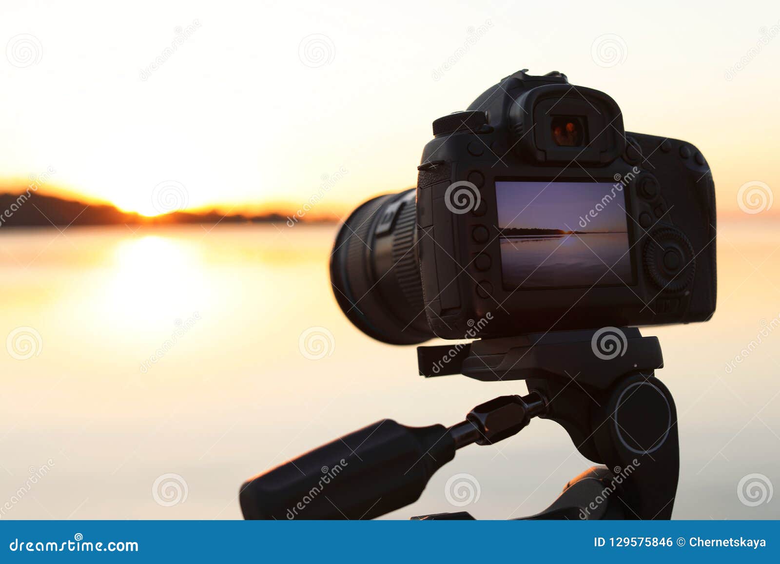 Photo of Beautiful Riverside Sunset on Display of Professional Camera ...