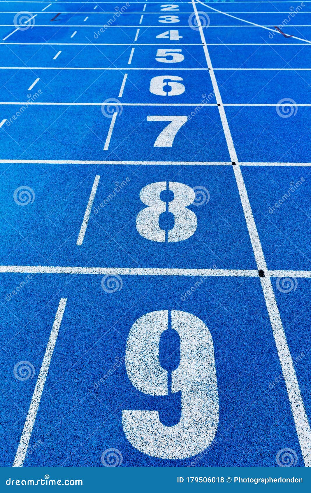 Photo of Blue Running Tracks Stock Photo - Image of athletes, seller ...