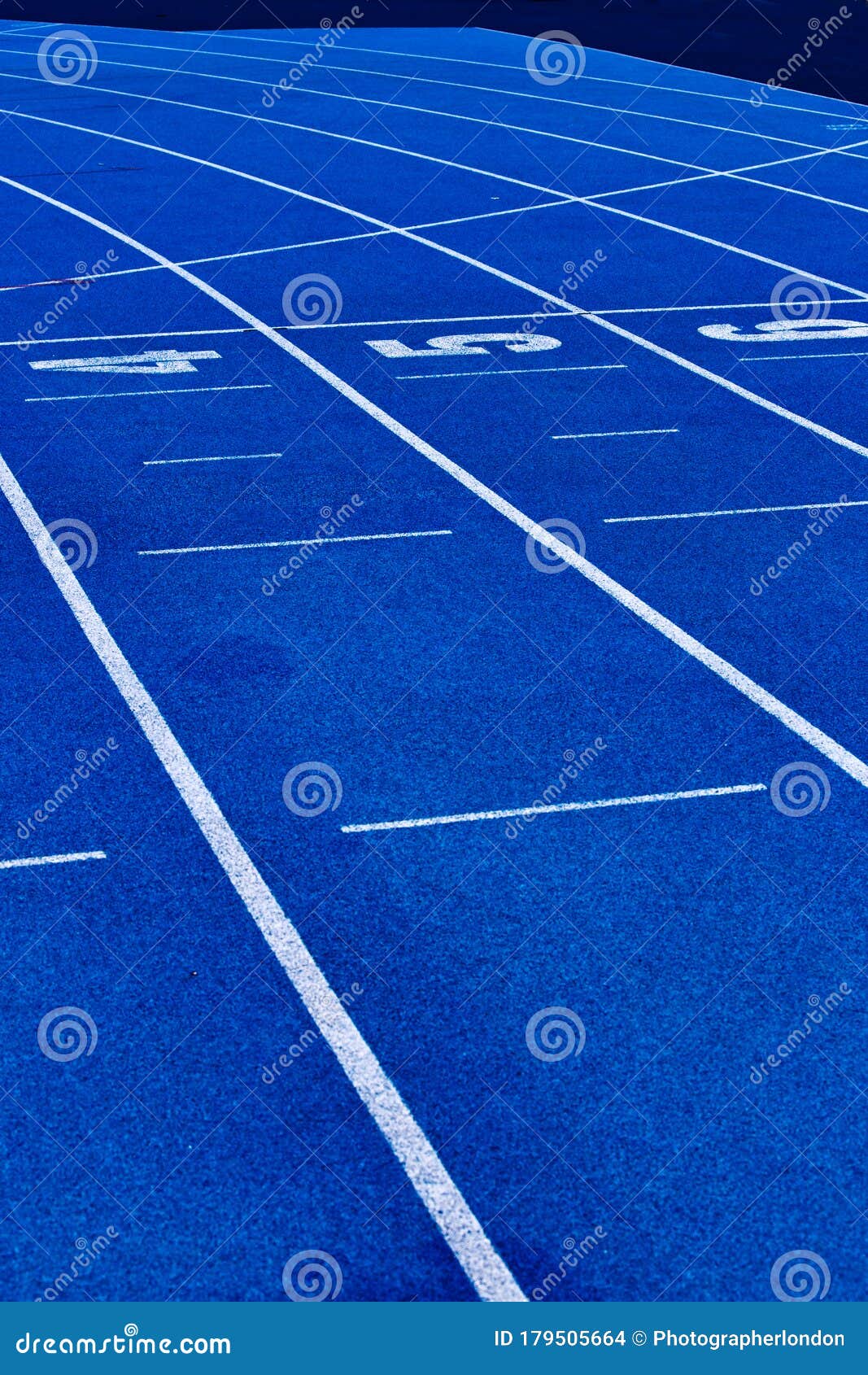 Photo of Blue Stadium Tracks Stock Photo - Image of seller, athletics ...