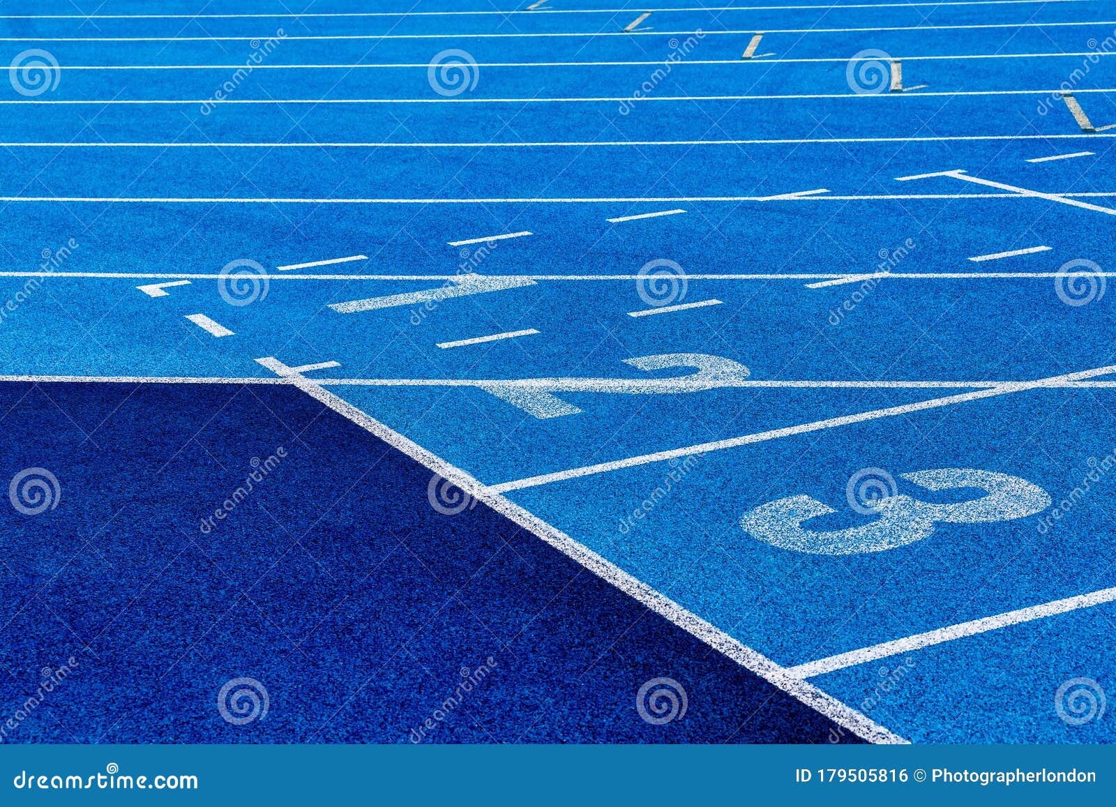 Photo of Blue Stadium Tracks Stock Photo - Image of game, closeup ...