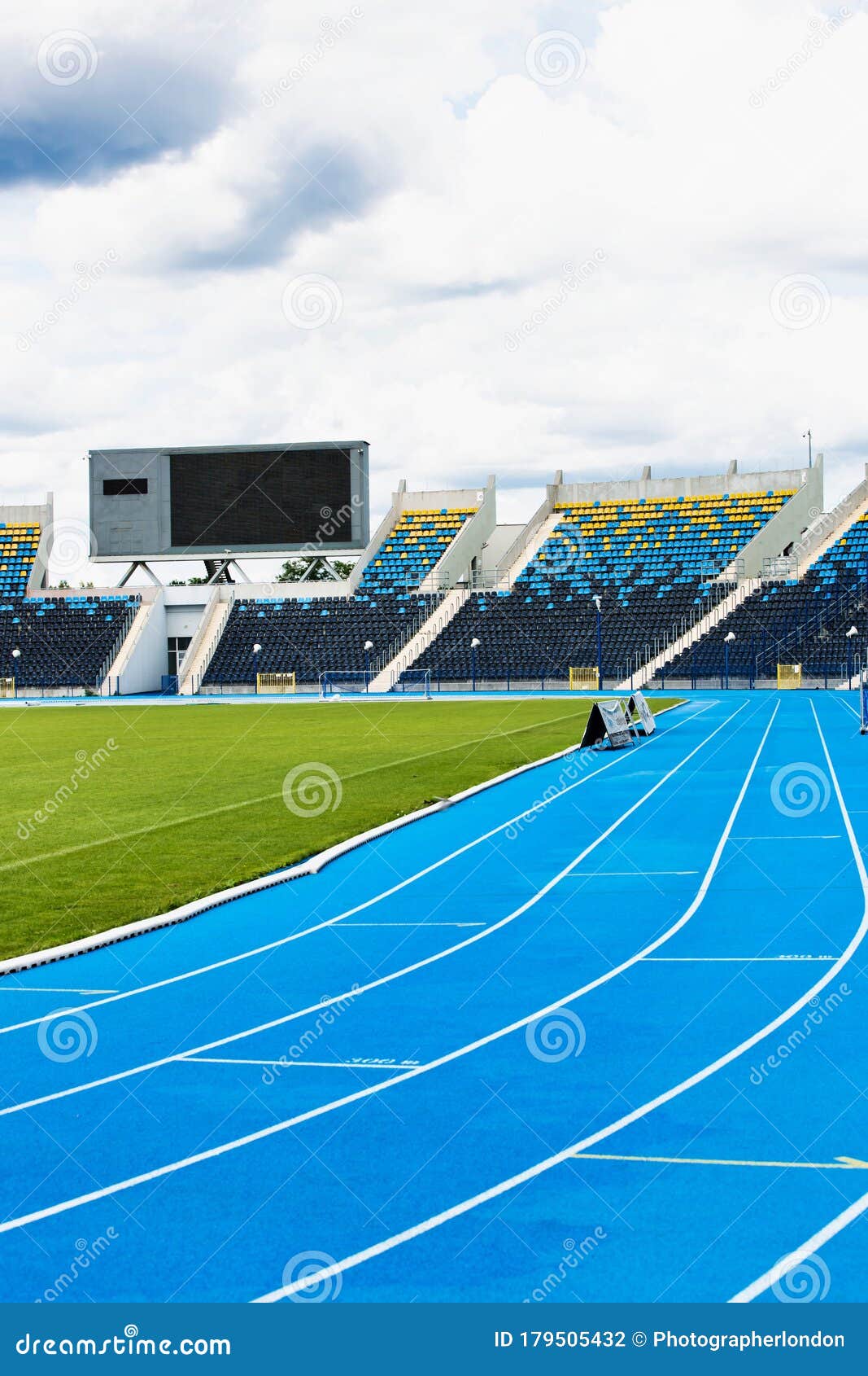 Photo of Blue Tracking Field on Stadium Stock Photo - Image of play ...