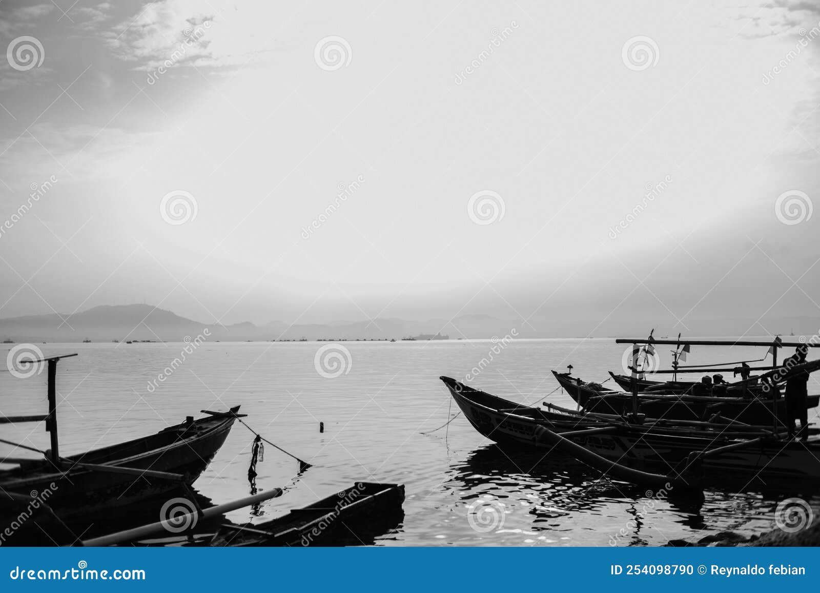 Photo of the Boat Leaning on the Edge of the Pier Stock Photo - Image ...