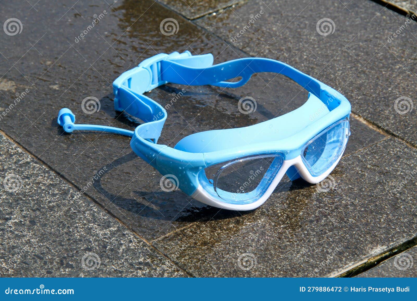 Photo of Bright Blue Swimming Goggles, in the Pool Area. Stock Photo ...