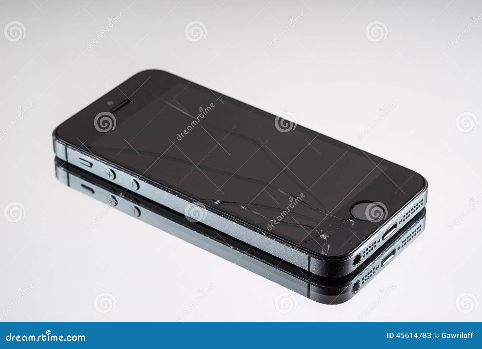 Photo of a broken iPhone 5 editorial stock photo. Image of device ...