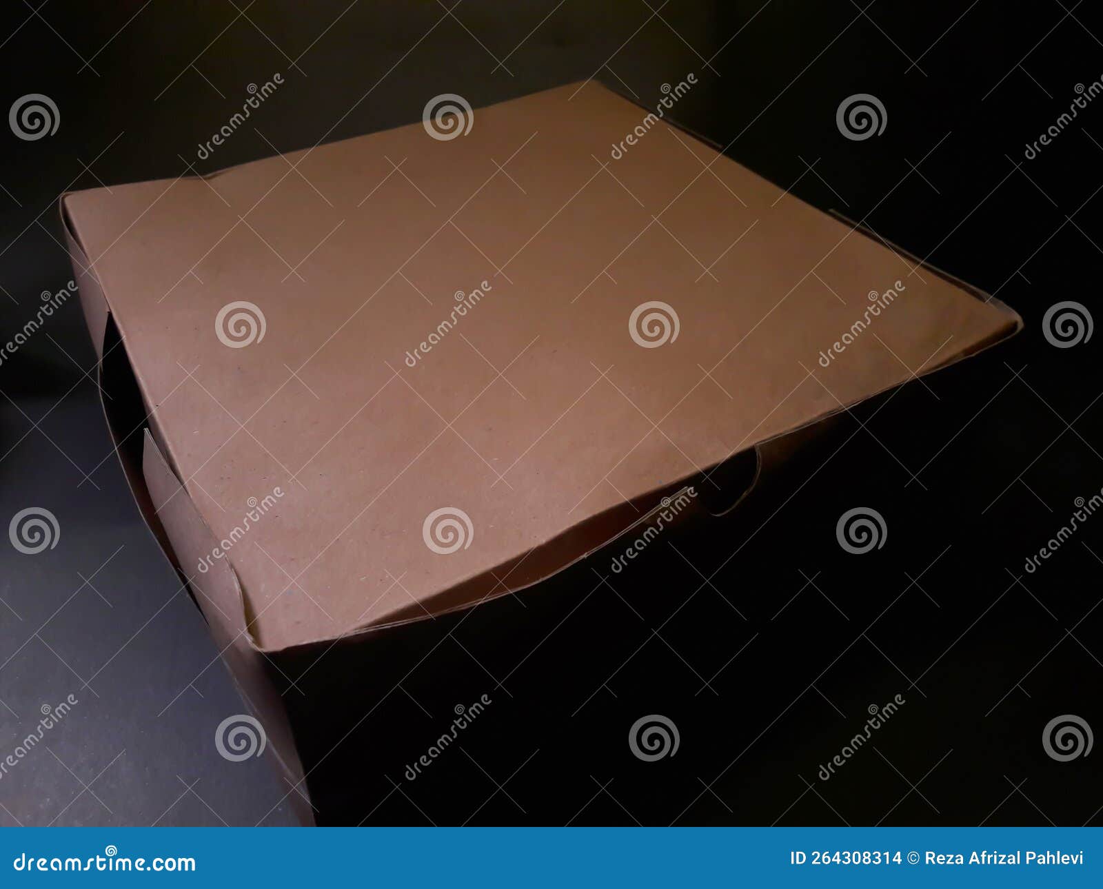 Photo of a Brown Paper Box with a Black Background Stock Photo - Image ...