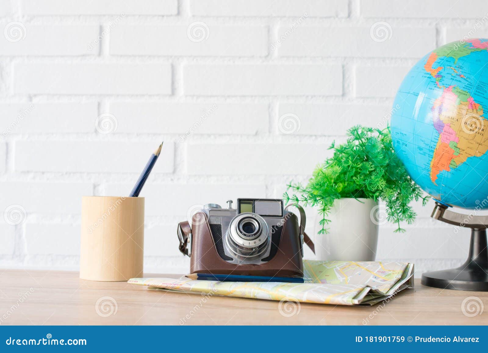 Photo camera with map stock image. Image of pencil, desk - 181901759